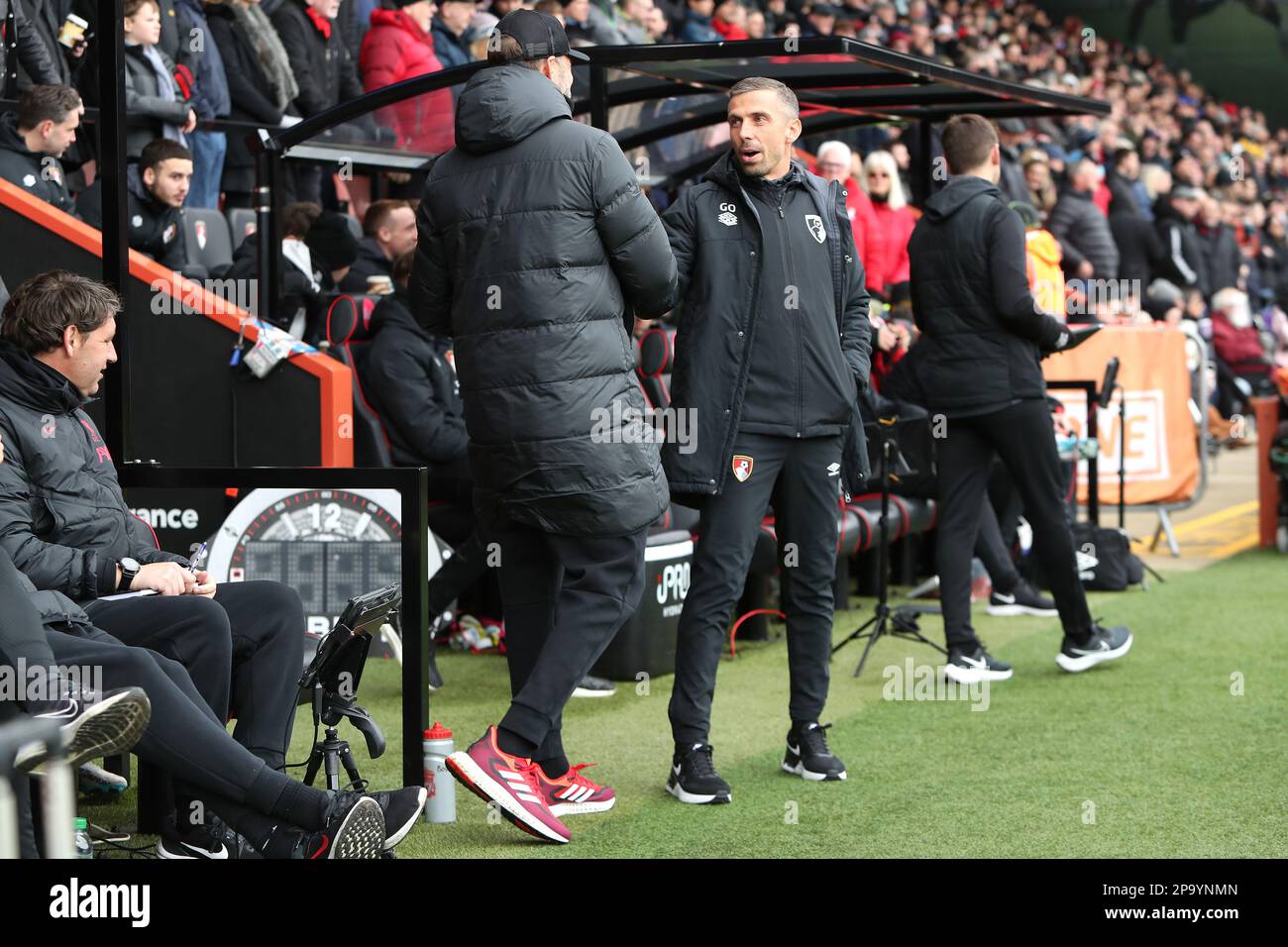 Liverpool manager Jurgen Klopp (left) and Bournemouth manager Gary O ...