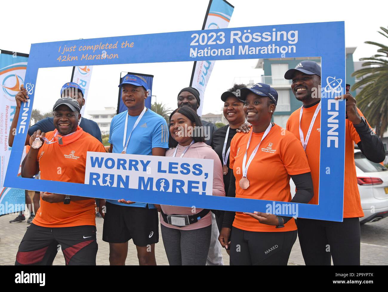 Swakopmund, Namibia. 11th Mar, 2023. Runners pose for photos after ...