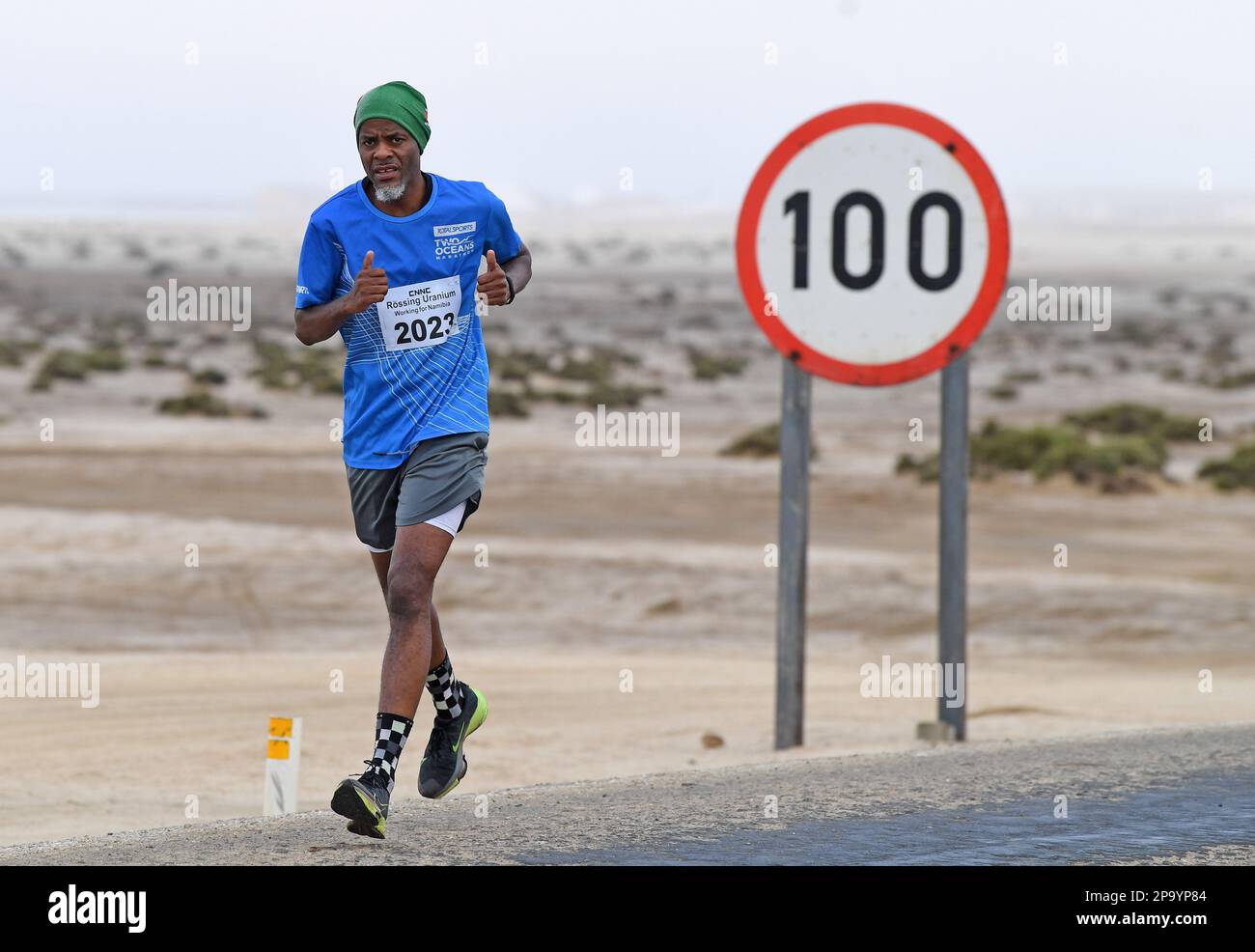 Swakopmund, Namibia. 11th Mar, 2023. A runner participates in the 2023 ...