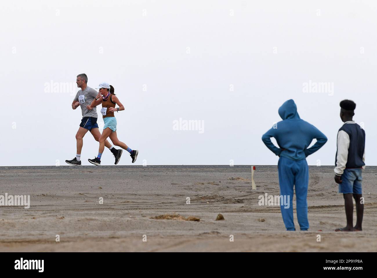 Swakopmund, Namibia. 11th Mar, 2023. Runners participate in the 2023 ...