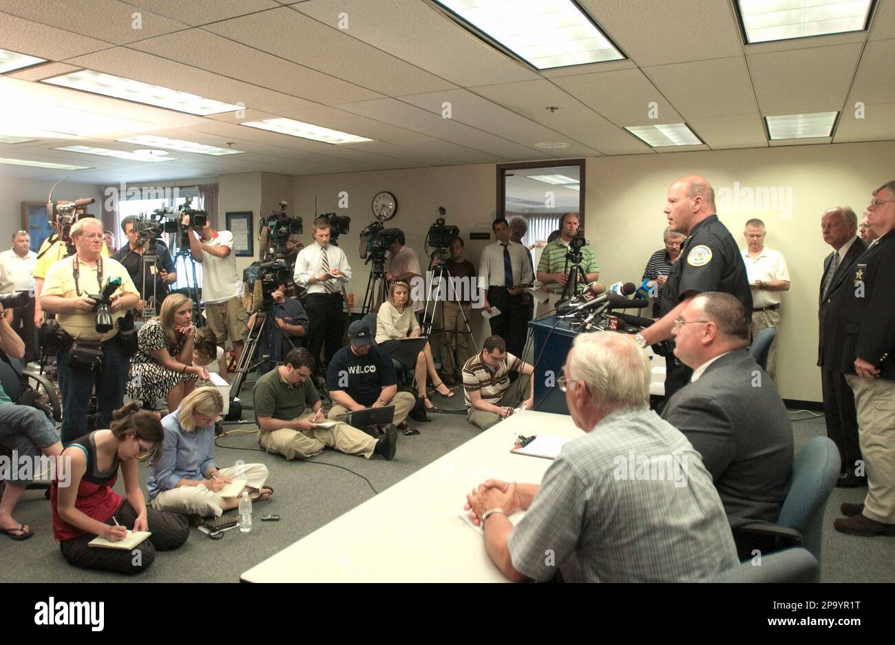 Henderson Chief of Police John C. Reed answers questions at a press ...