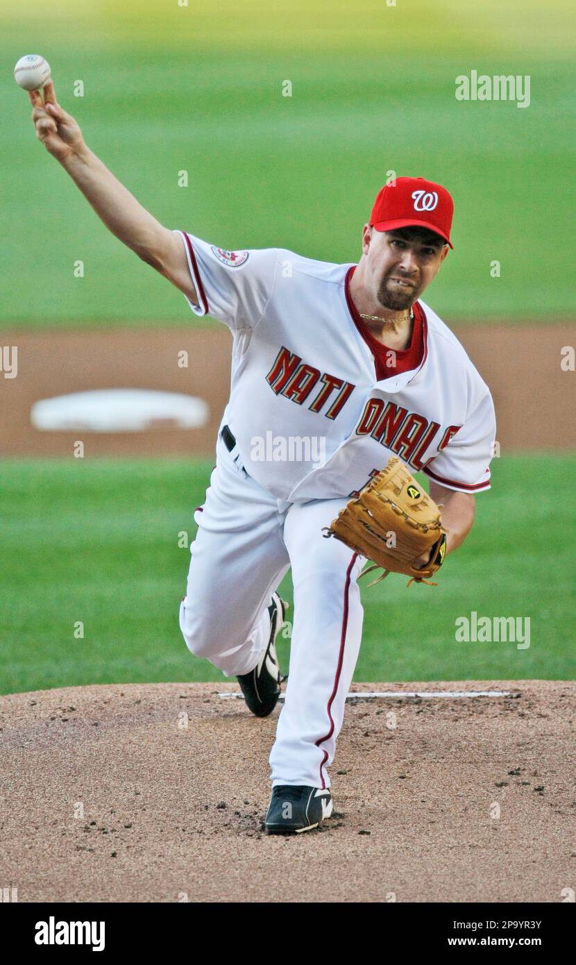 Washington Nationals pitcher Tim Redding delivers to the Los Angeles ...