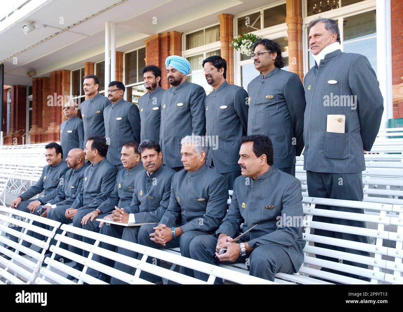 India's 1983 cricket World Cup winning team sit around their captain ...