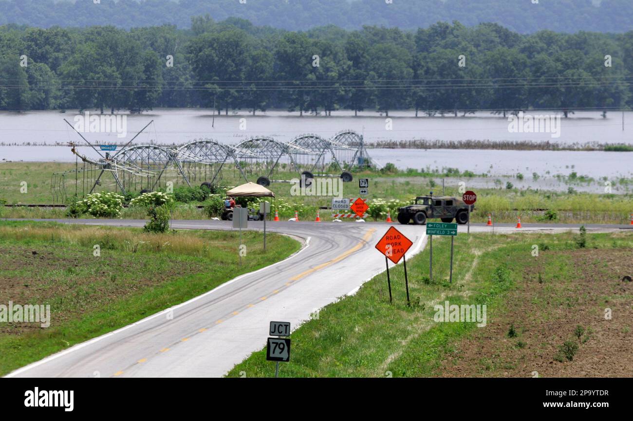 Members of the Missouri National Guard monitor traffic along Highway 79 ...