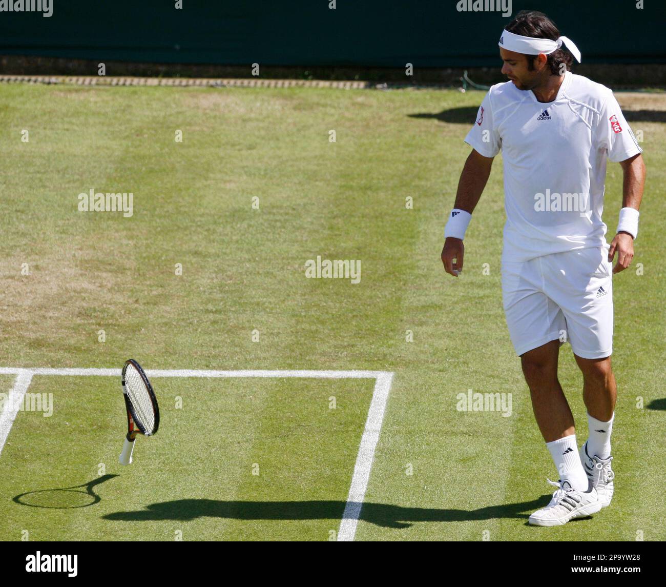 Chile's Fernando Gonzalez throws his racquet, during his second round ...