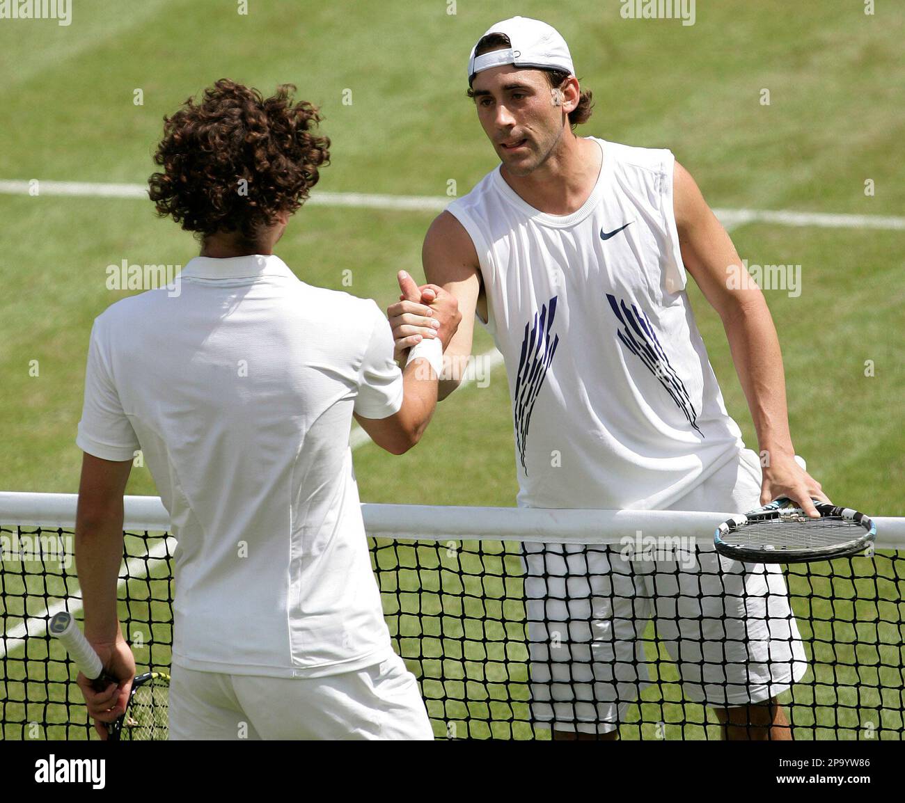 Bobby Reynolds right, of the US is congratulated by Canada's Frank ...