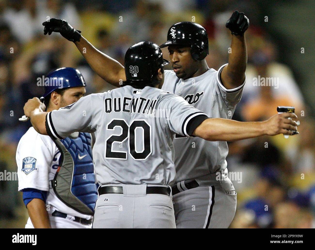 Chicago White Sox's Carlos Quentin (20) celebrates with teammates ...