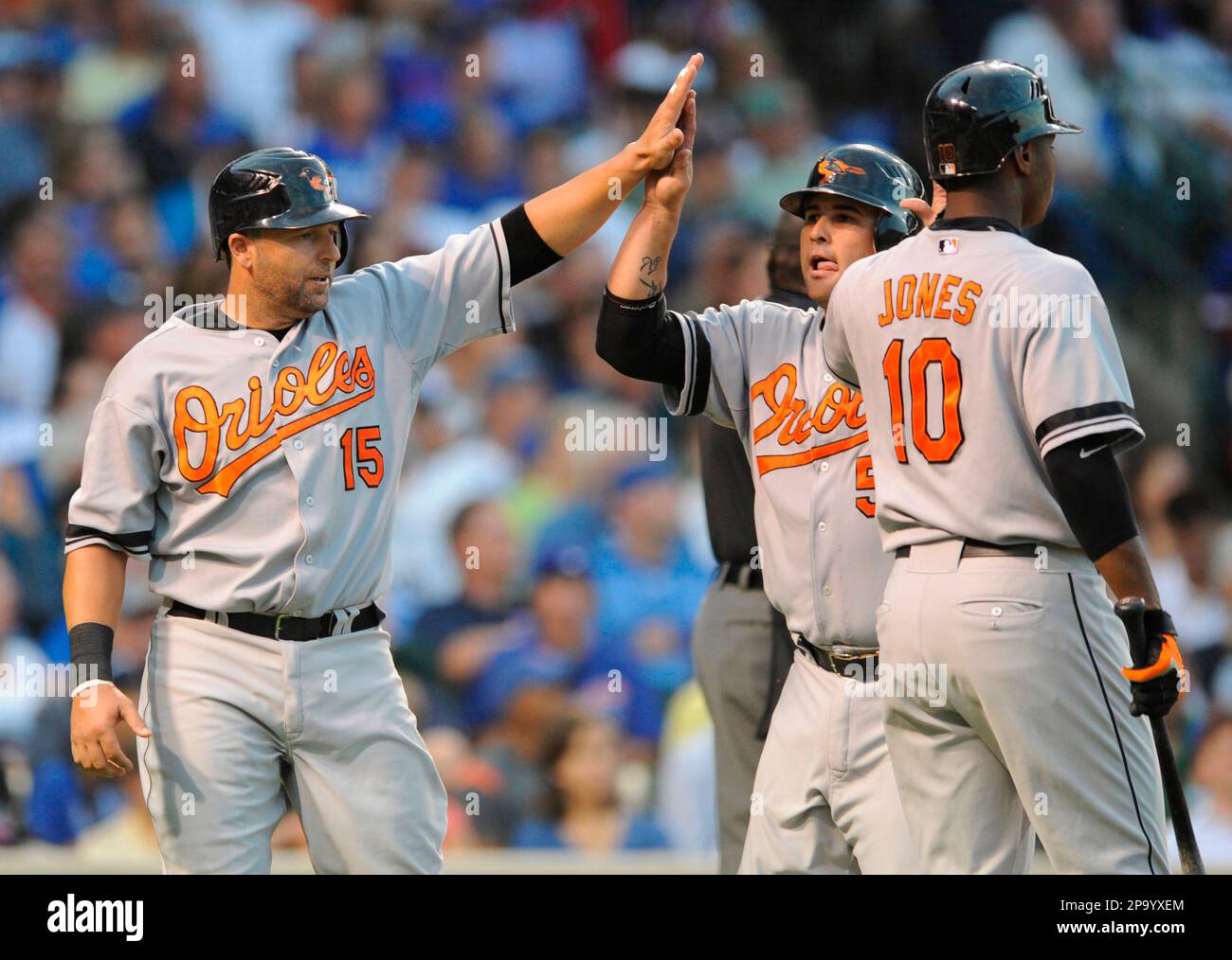 Baltimore Orioles' Ramon Hernandez, center, celebrates with teammates ...