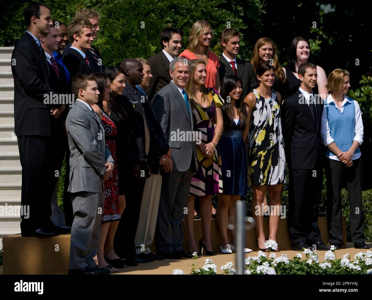President Bush poses for a photograph with the team captains of 2007 ...