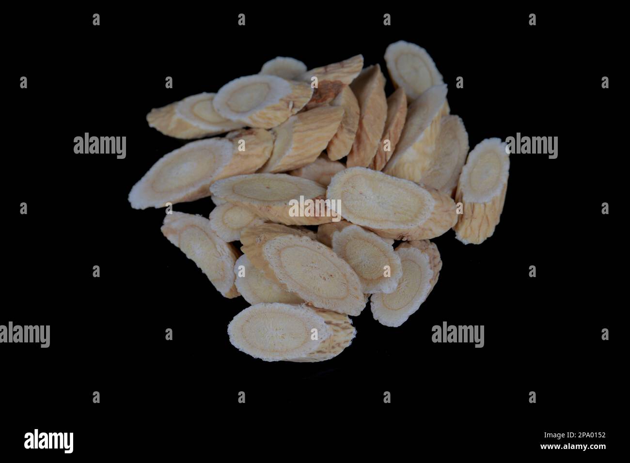 Chinese herbal medicine astragalus membranaceus on a white background ...