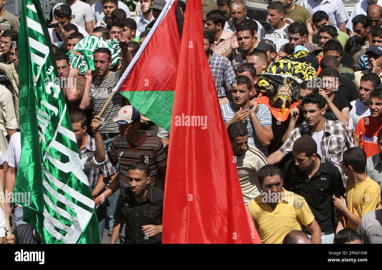 Palestinian mourners carry the bodies of Islamic Jihad militant Tarek ...