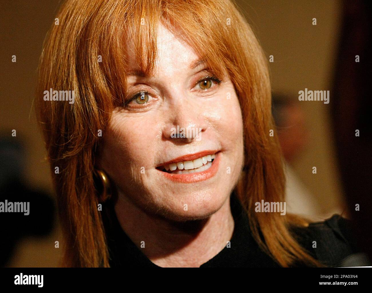 Actress Stefanie Powers speaks to reporters at a press conference for ...