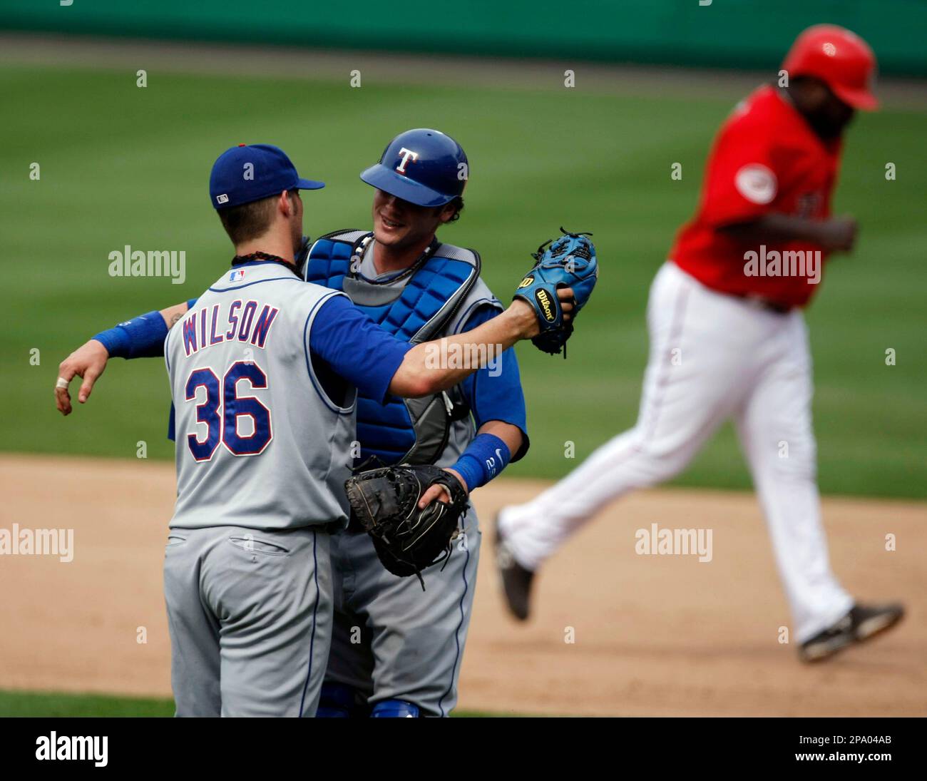 Texas Rangers relief pitcher C.J. Wilson, left, and catcher Jarrod ...