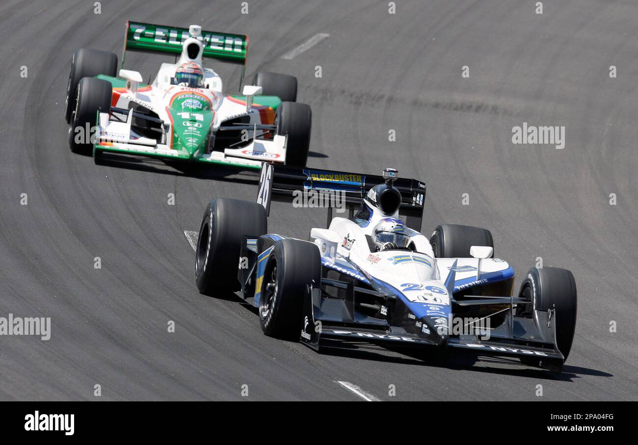 Marco Andretti, right, leads Tony Kanaan, of Brazil, during the IndyCar ...