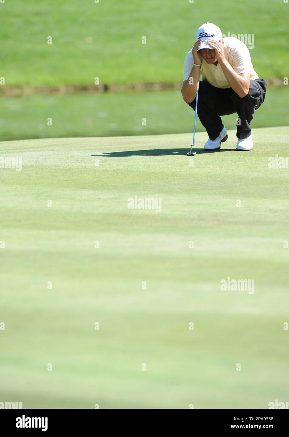 German golfer Martin Kaymer lines upa putt during the final round of ...