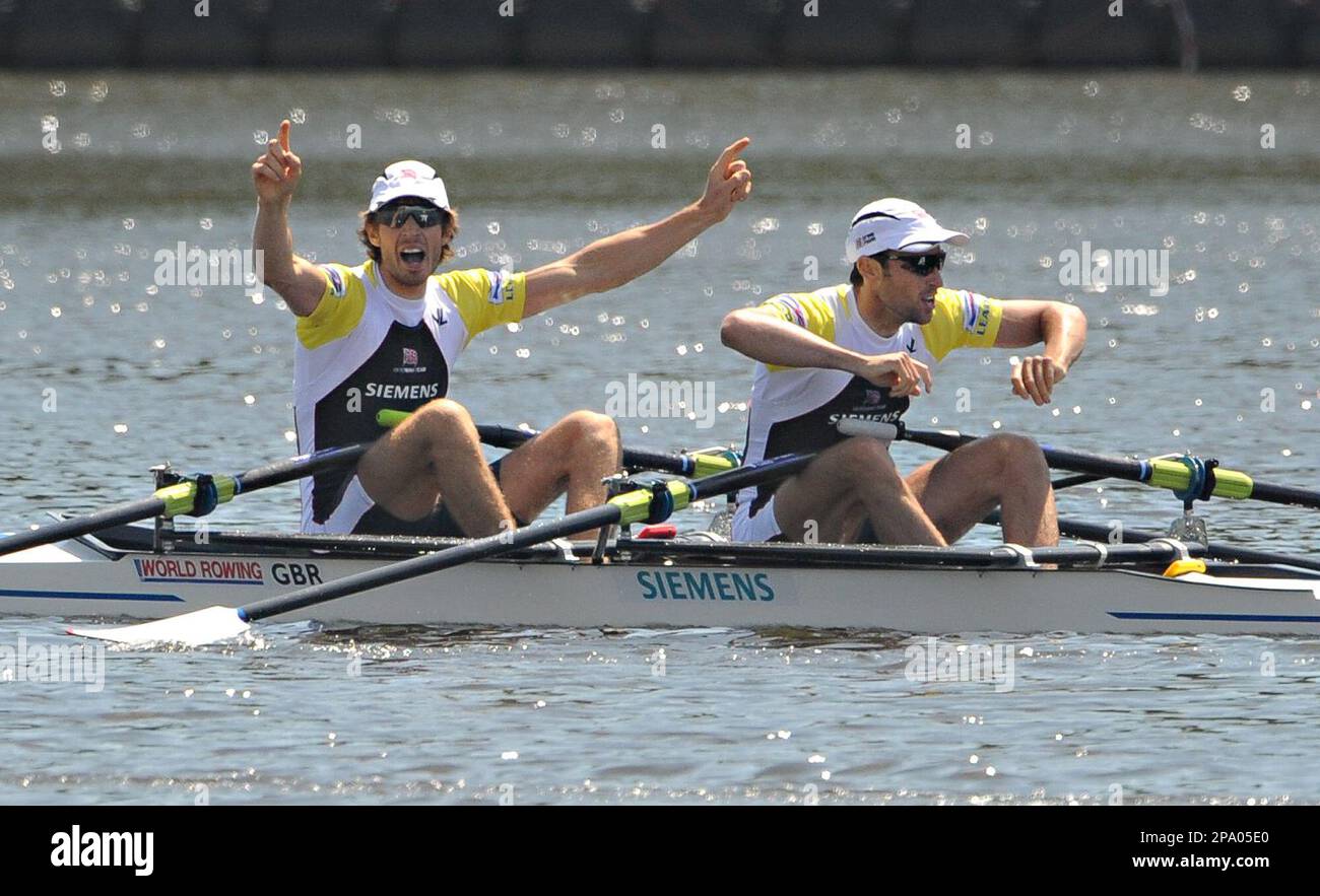 Great Britain's Zac Purchase, left, and Mark Hunter react after winning ...