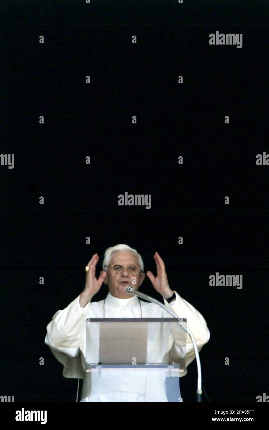 Pope Benedict XVI delivers his Angelus prayer from his studio window ...
