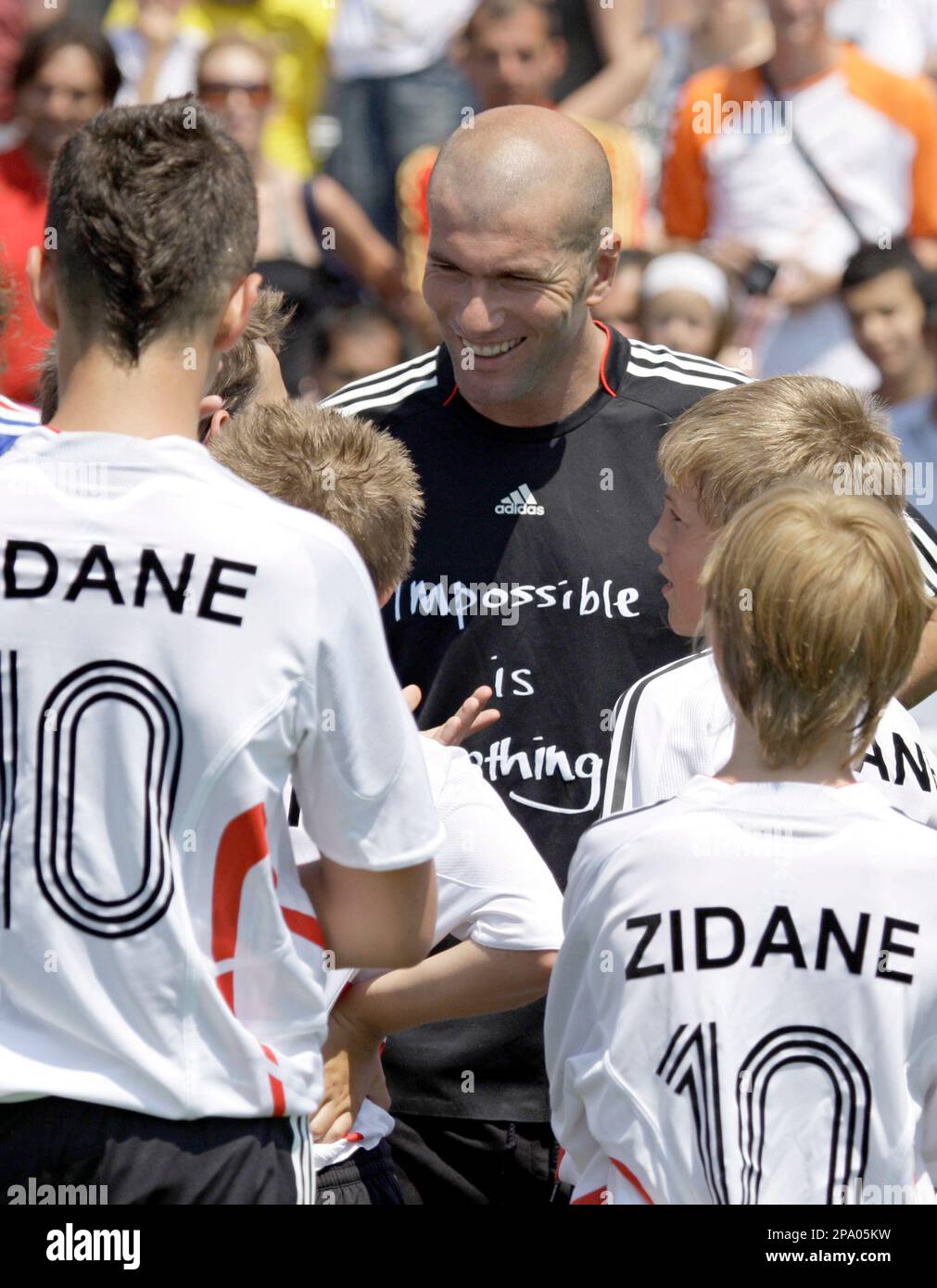 Zinedine Zidane, former national soccer player of France, center ...