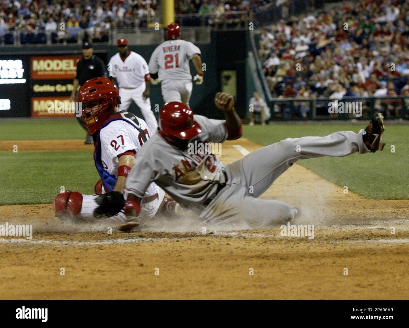 Los Angeles Angels' Gary Matthews Jr., foreground, slides safely into ...