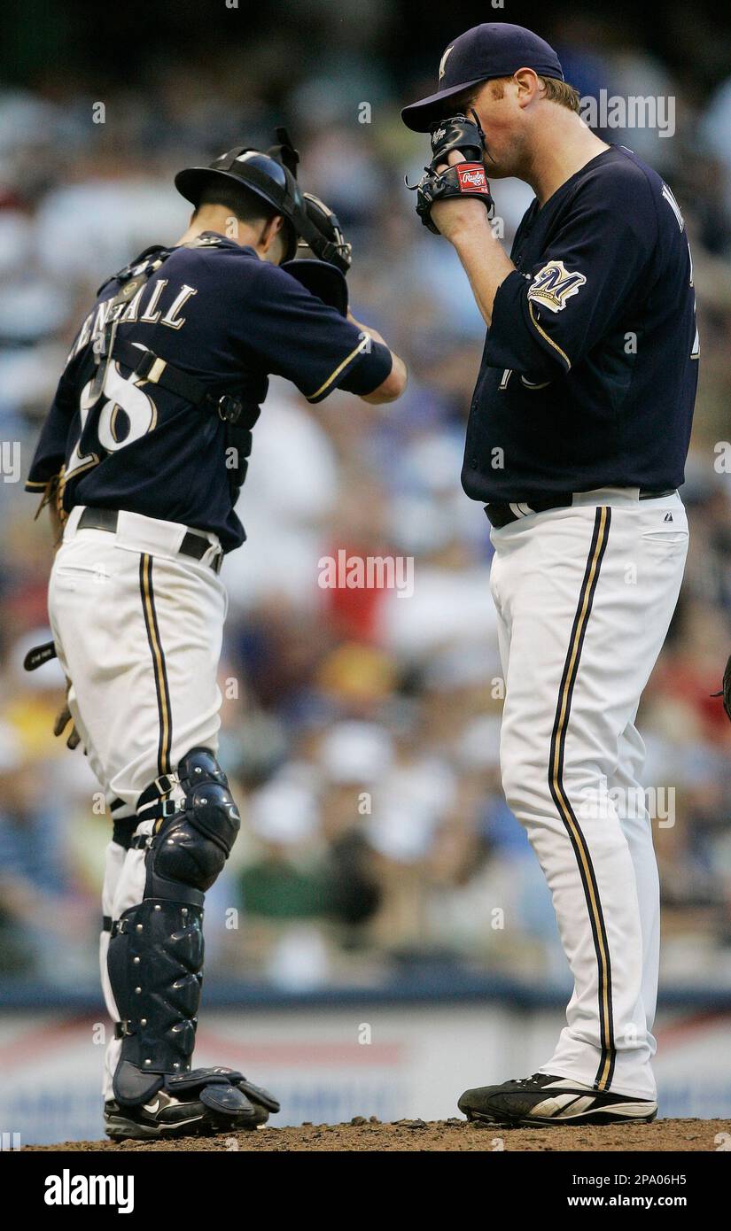 Milwaukee Brewers starting pitcher Seth McClung talks with catcher ...