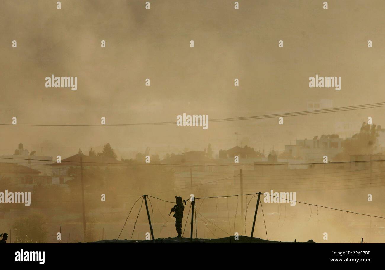 A member of Palestinian President Mahmoud Abbas' security force on ...
