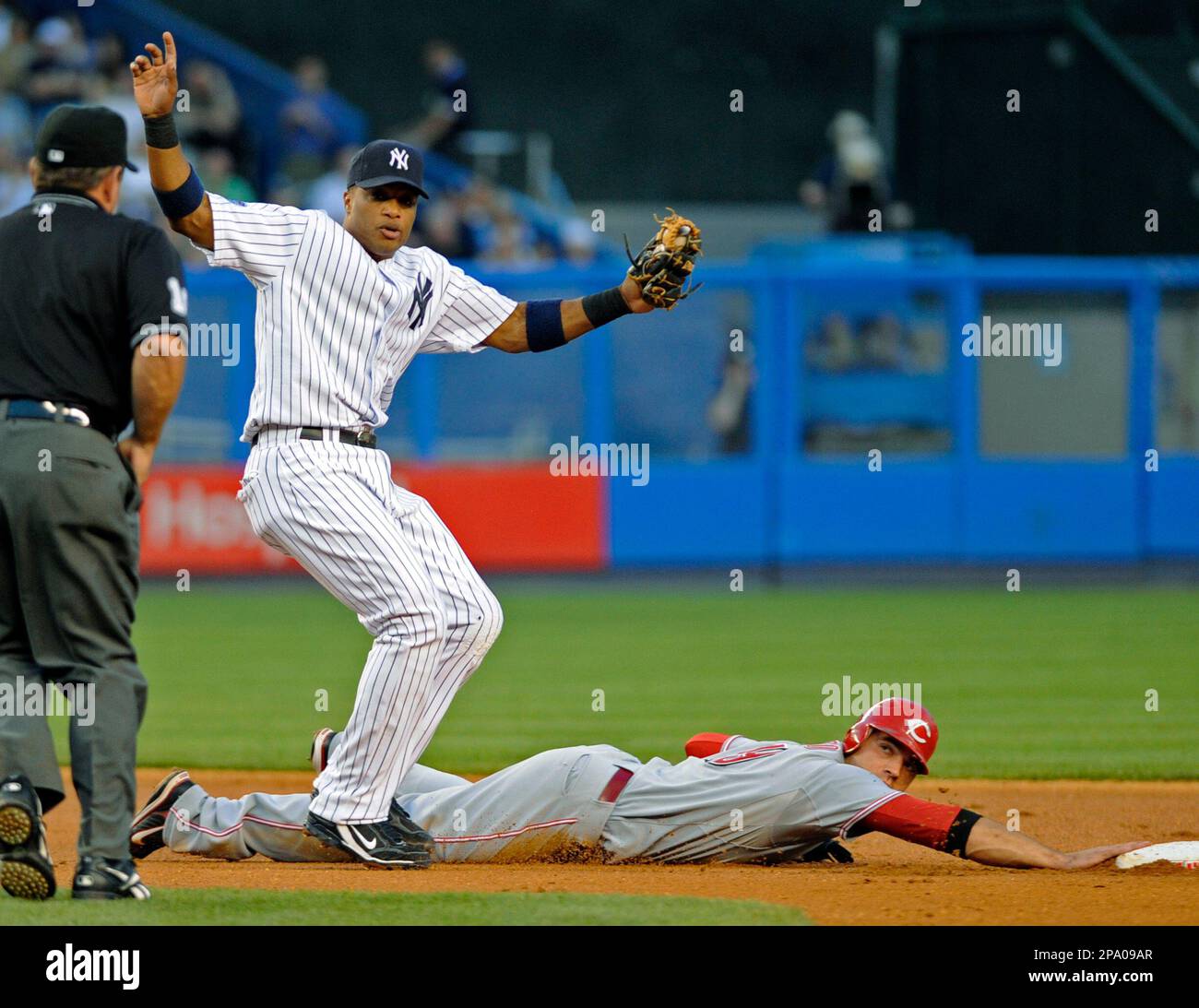 New York Yankees second baseman Robinson Cano looks to umpire Charlie ...