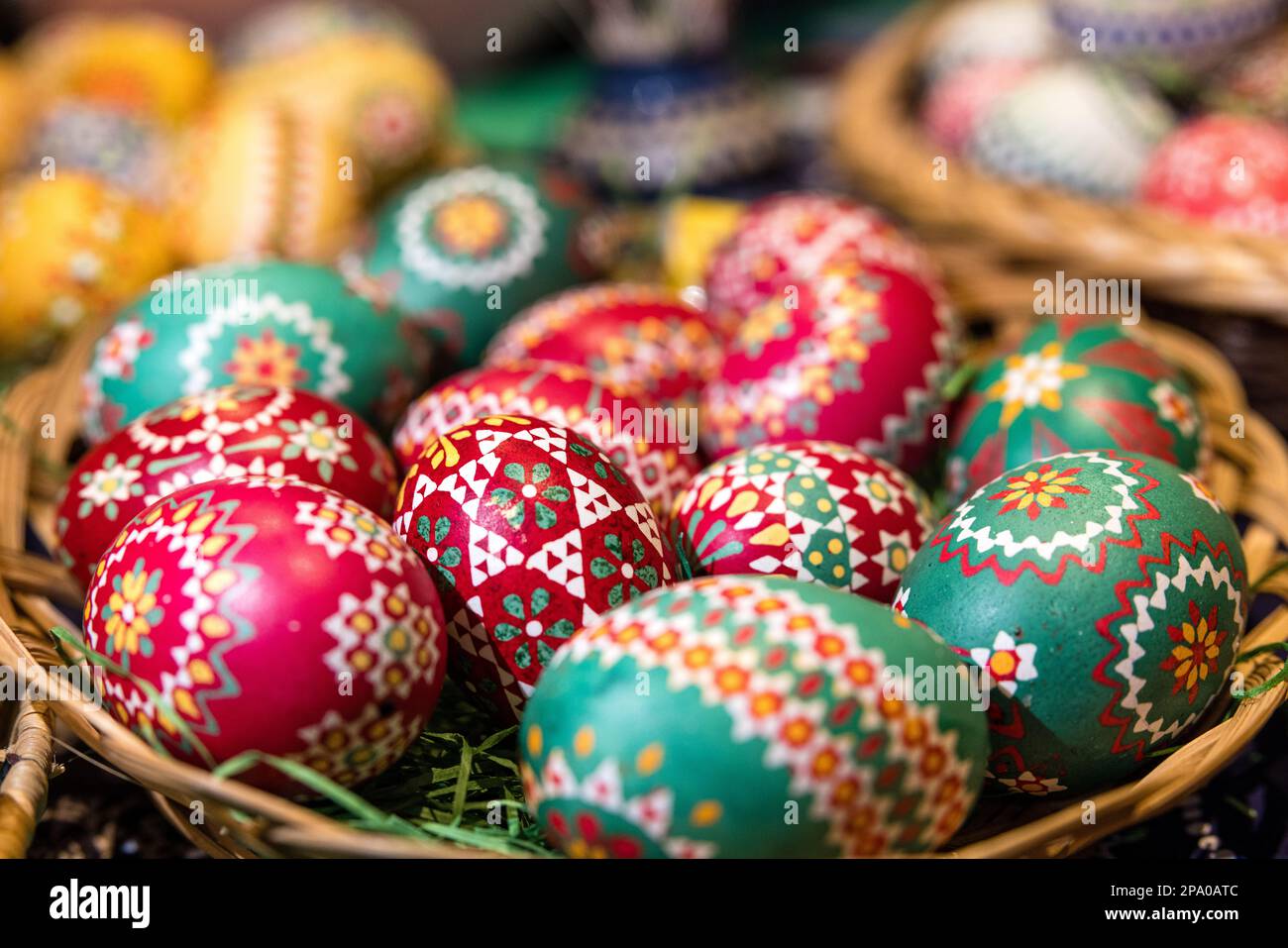 11 March 2023, Brandenburg, Lübbenau: Decorated Easter eggs lie in a ...