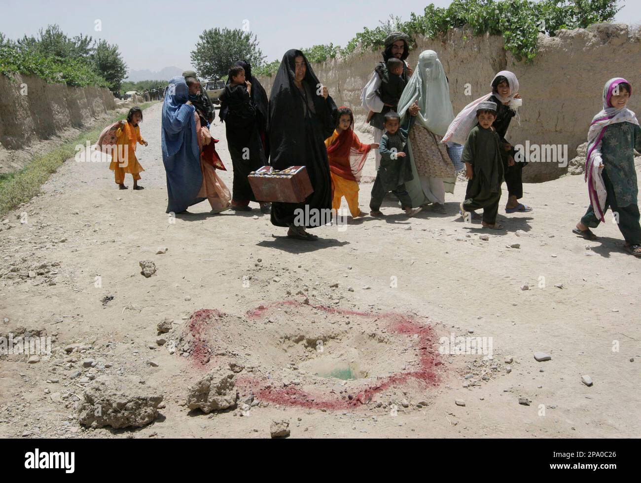 Afghan villagers, who fled their villages when Taliban militants took ...