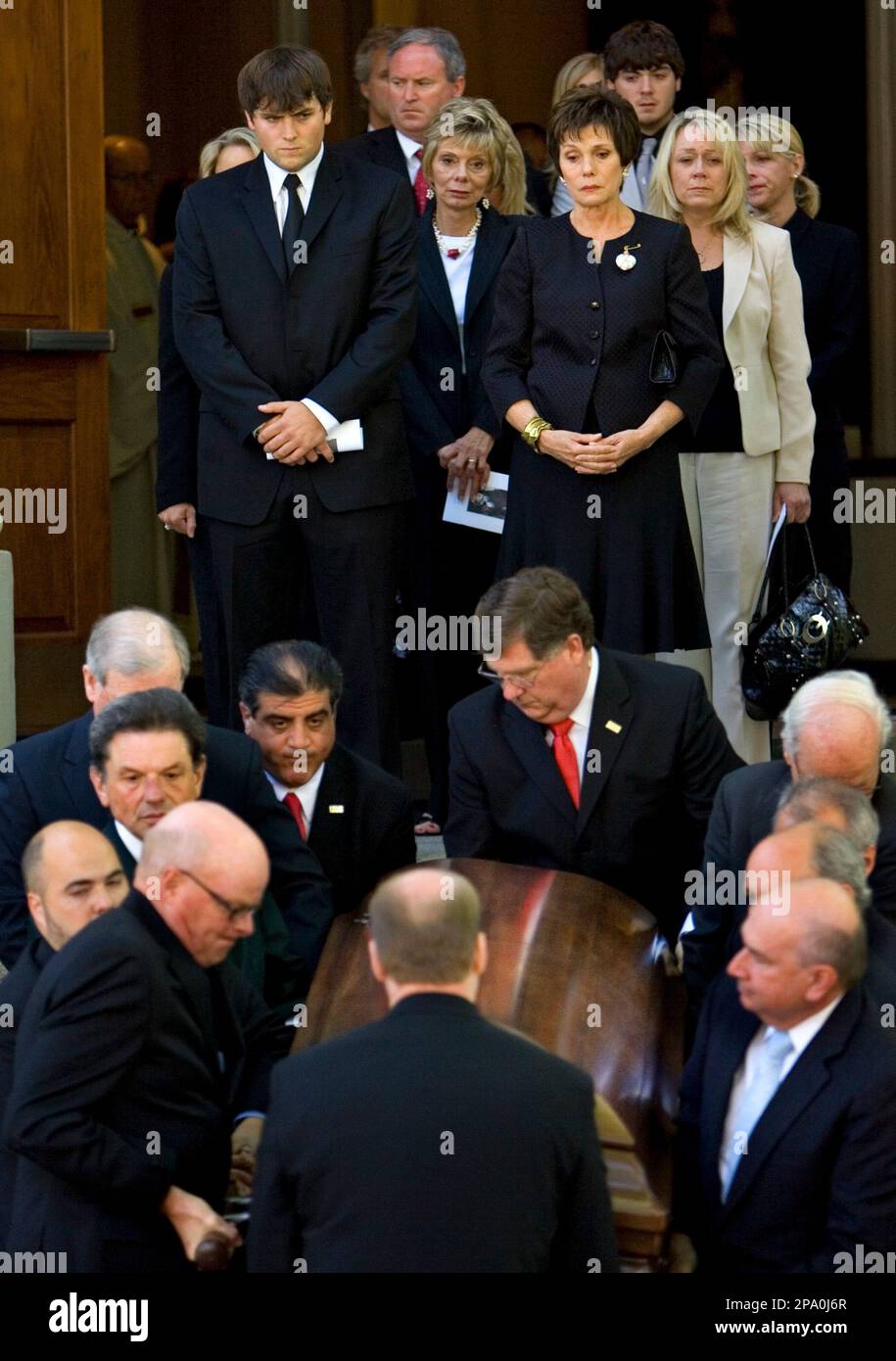 Maureen Orth, widow of Tim Russert, center, and their son, Luke Russert ...