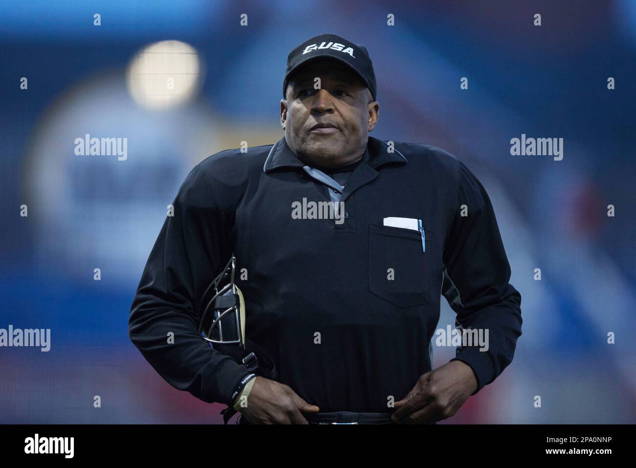 Home plate umpire David Brown works the NCAA baseball game between the ...