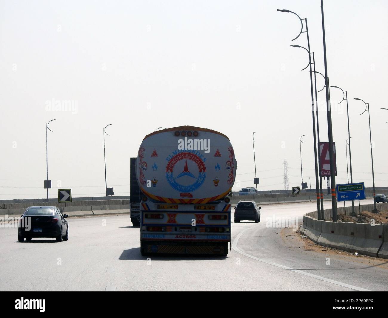 Giza, Egypt, March 9 2023: A big truck with a container tank with ...