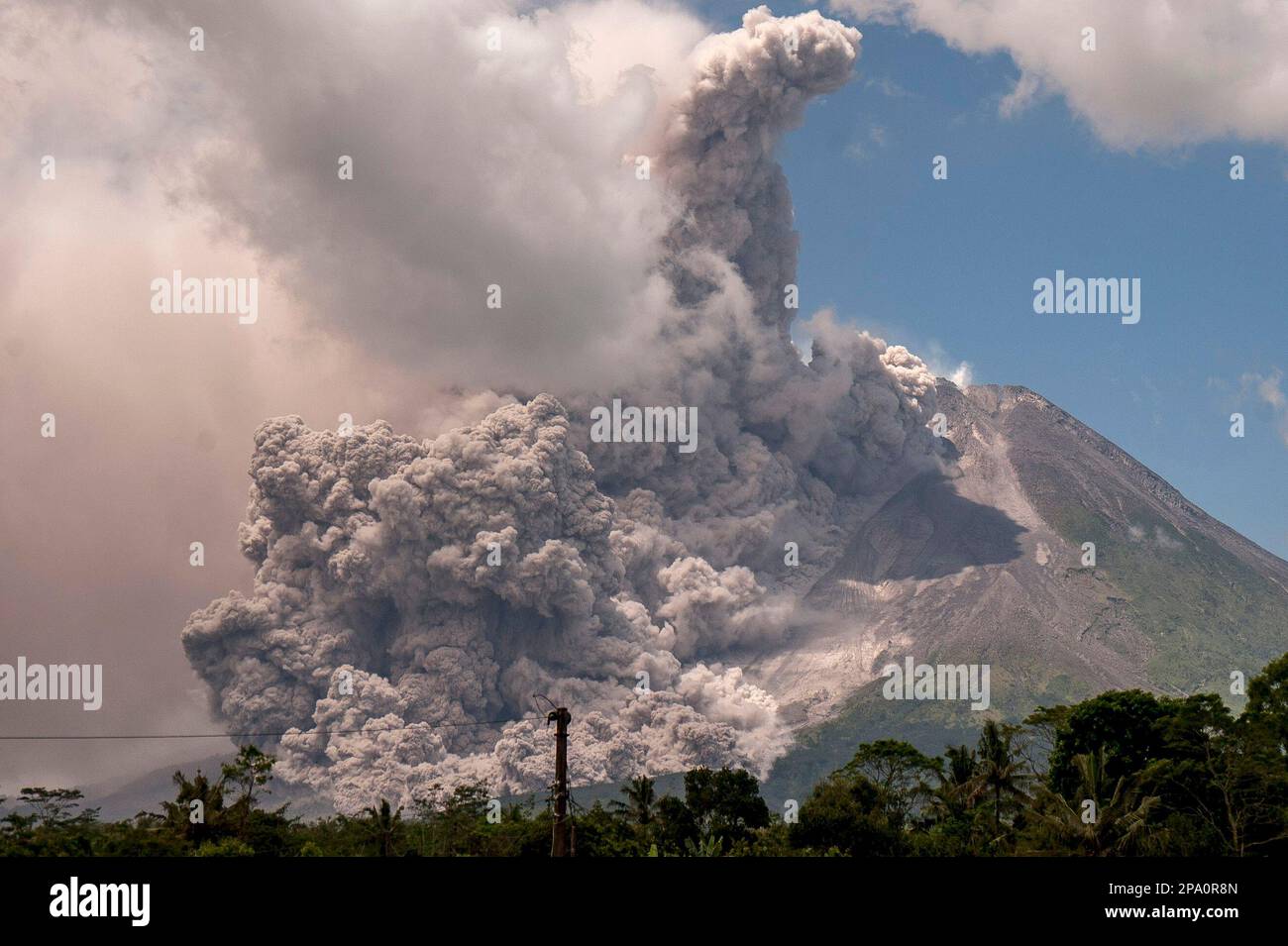 Yogyakarta, Indonesia. 11th Mar, 2023. Volcanic materials spew out from ...