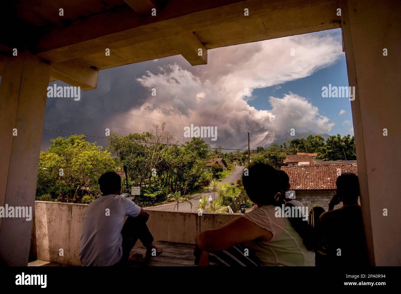 Yogyakarta, Indonesia. 11th Mar, 2023. People look at erupting Mount ...