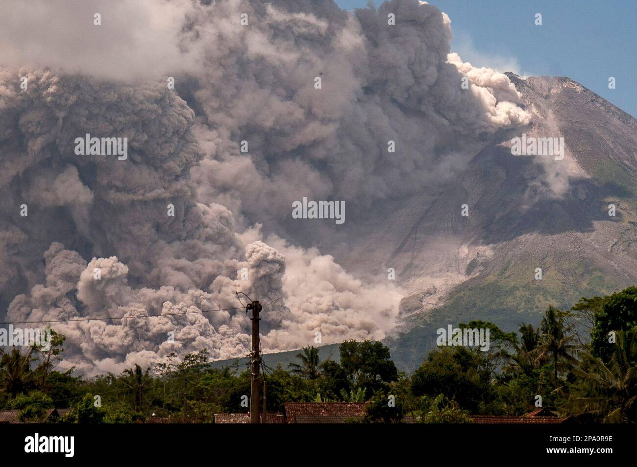 Yogyakarta, Indonesia. 11th Mar, 2023. Volcanic materials spew out from ...