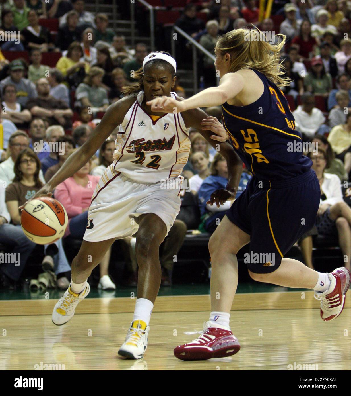 Seattle Storm's Sheryl Swoopes, left, drives to the basket as ...