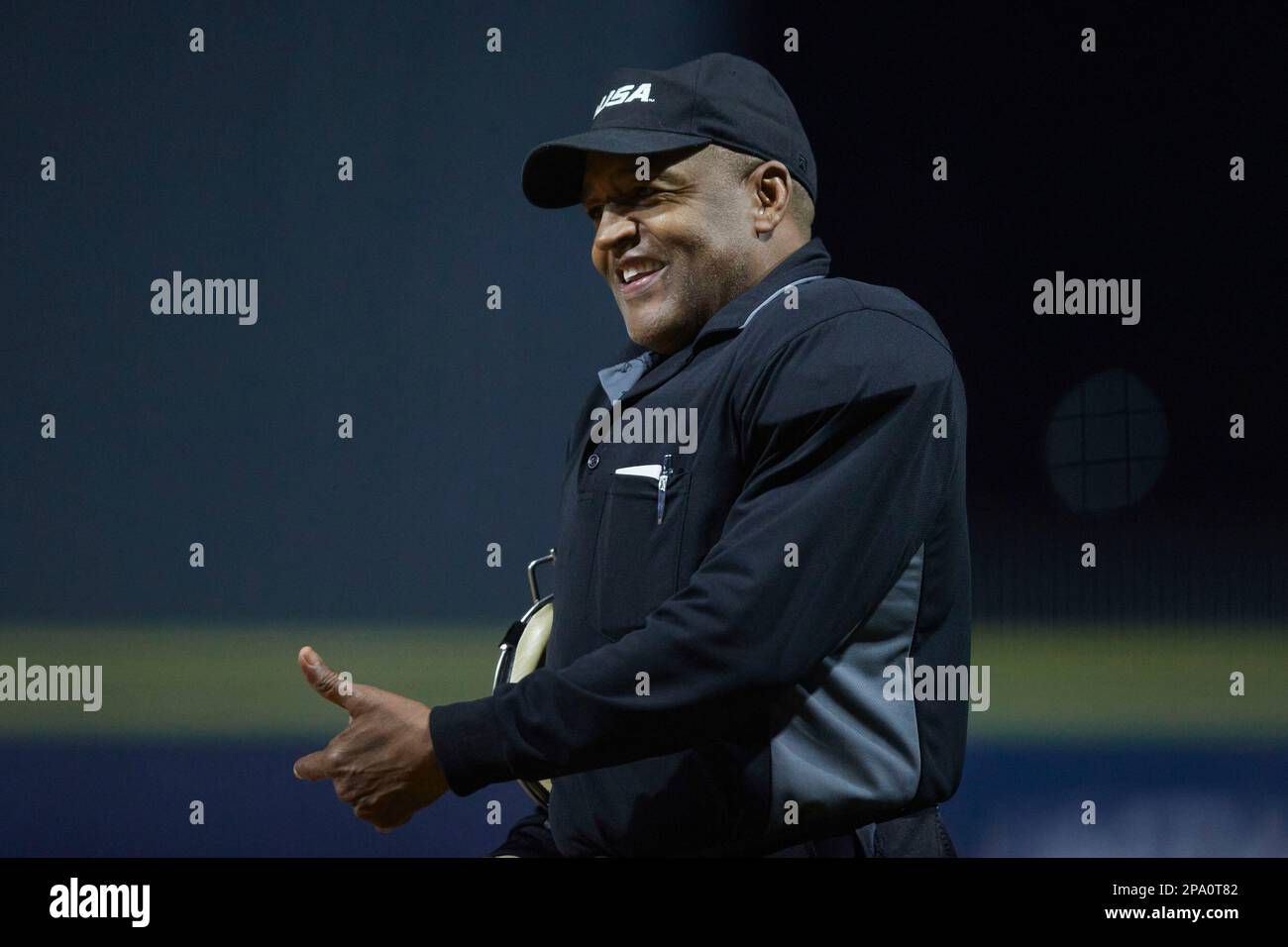 Home plate umpire David Brown works the NCAA baseball game between the ...