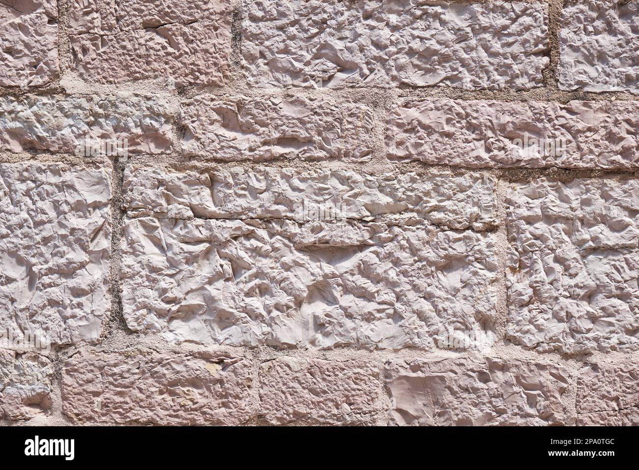Brick wall, beige shell rock. Repeating stone texture background Stock ...