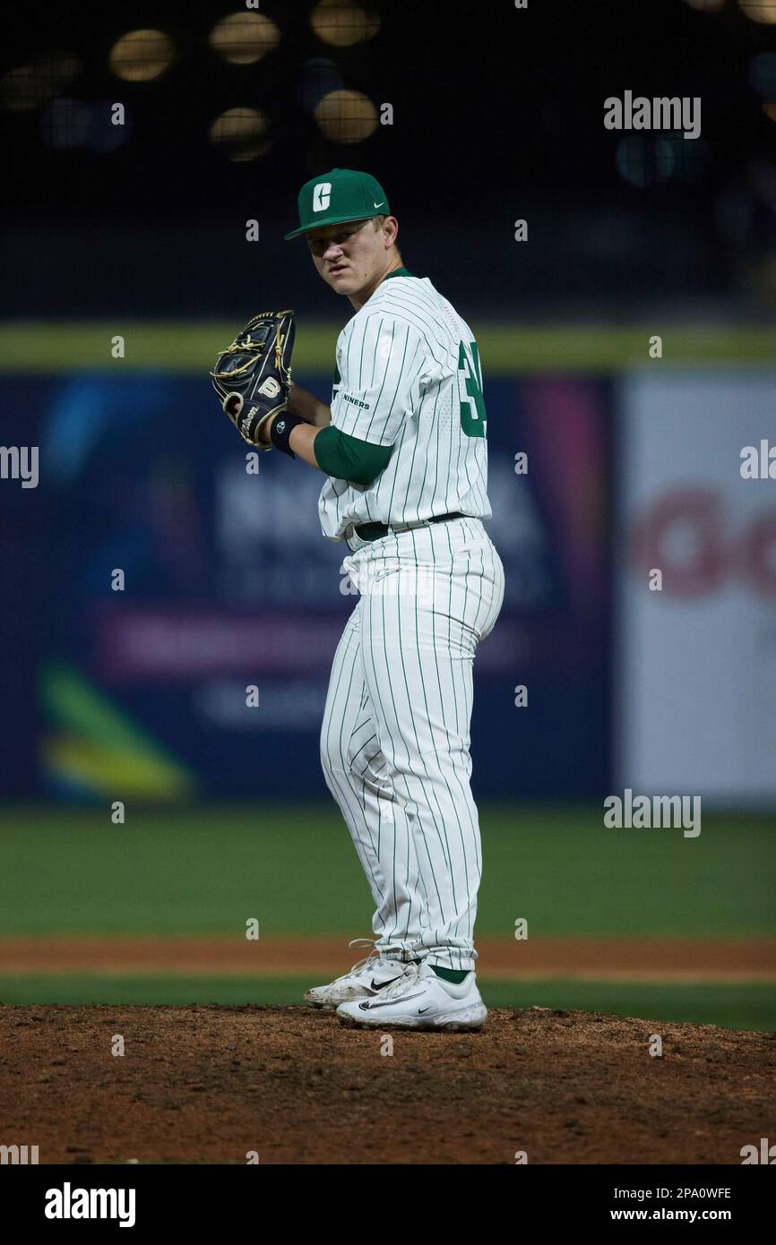 Charlotte 49ers relief pitcher Evan Michelson (34) stares in at his ...