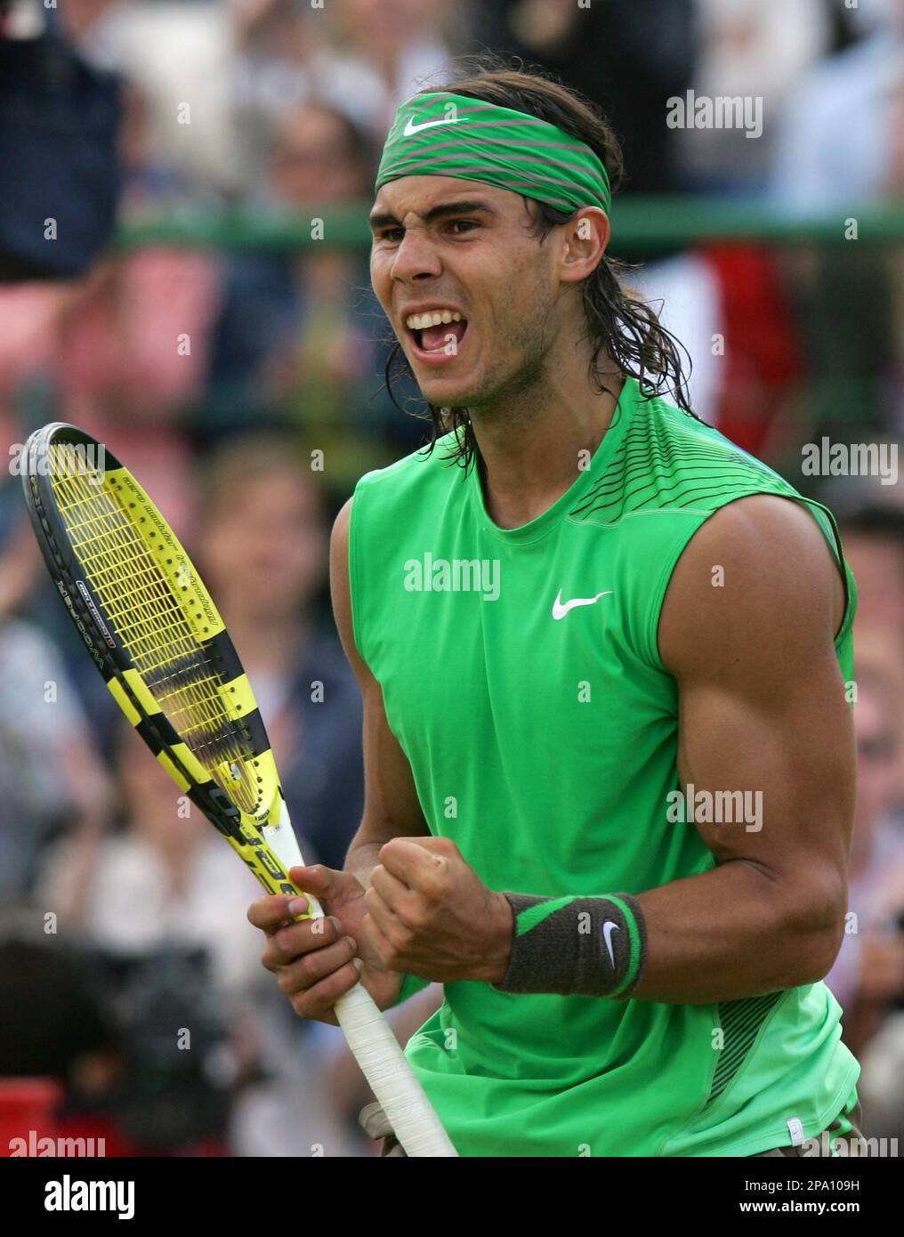 Spain's Rafael Nadal reacts after beating Serbia's Novak Djokovic ...