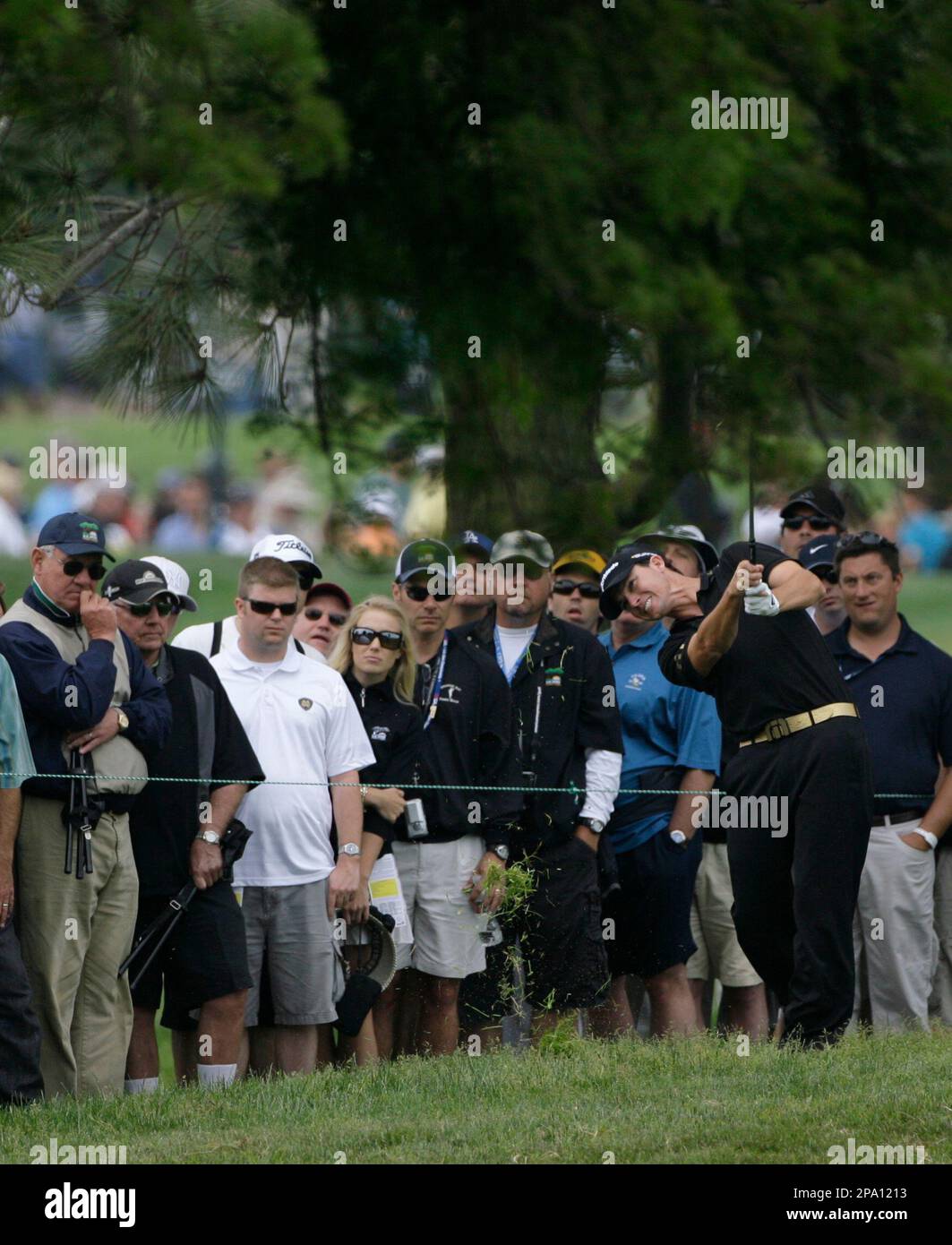 John Mallinger hits out of the rough on the 15th fairway during the ...