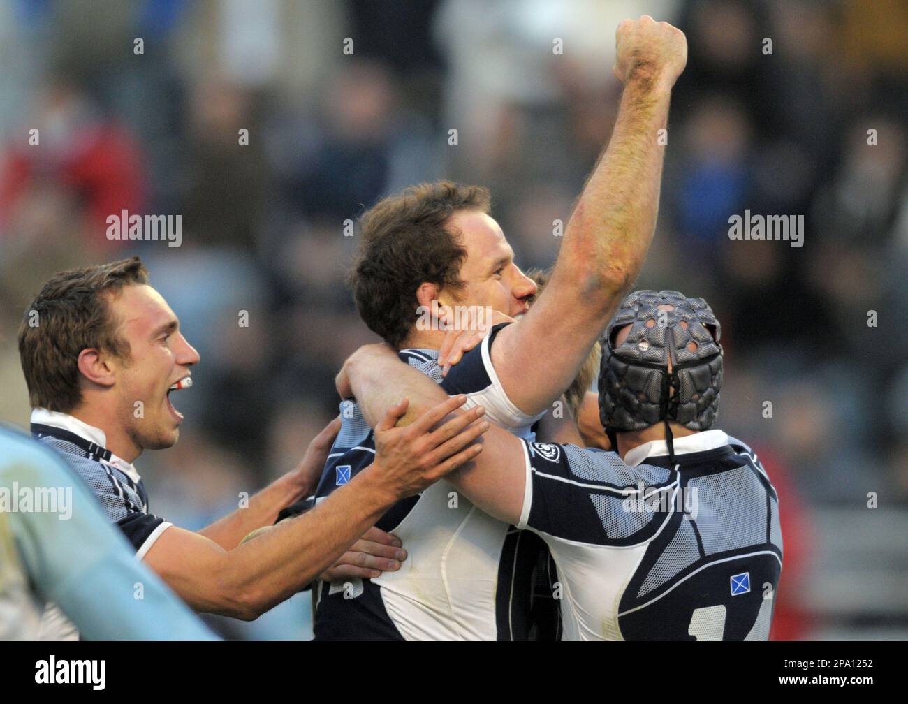 Scotland's Graeme Morrison, center, celebrate with teamates a try ...
