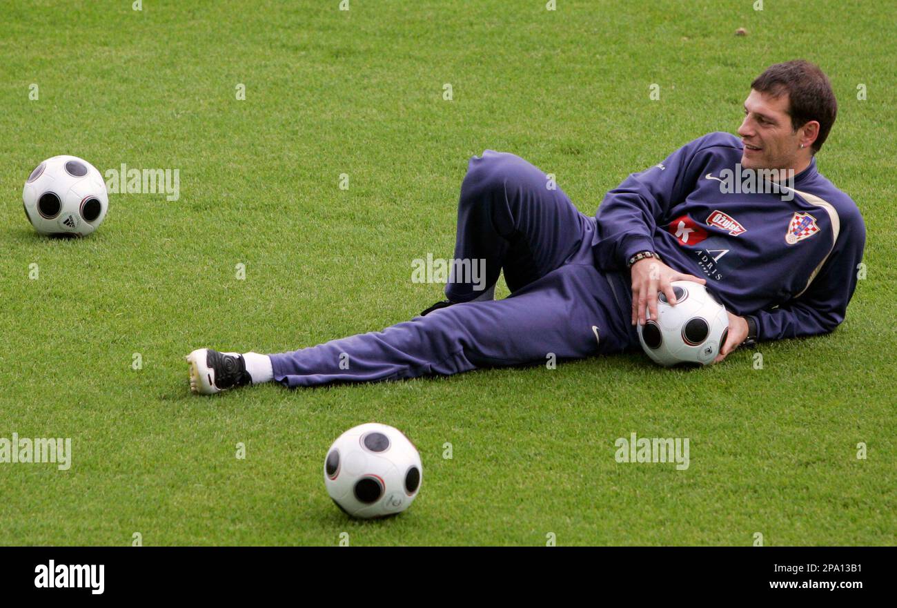 Coach Slaven Bilic holds a ball during a training session of the ...
