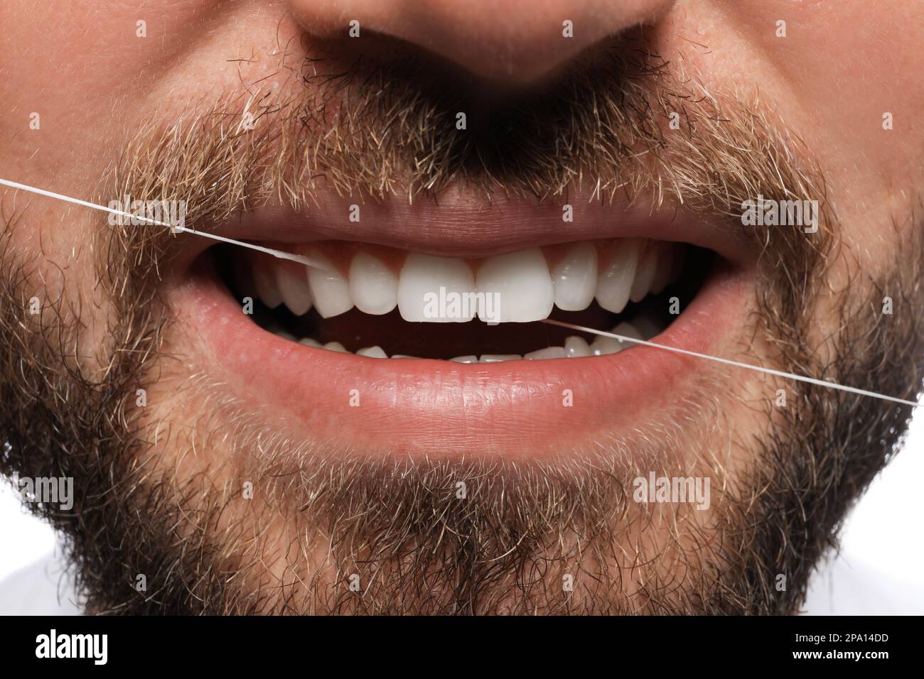 Man flossing teeth hi-res stock photography and images - Alamy