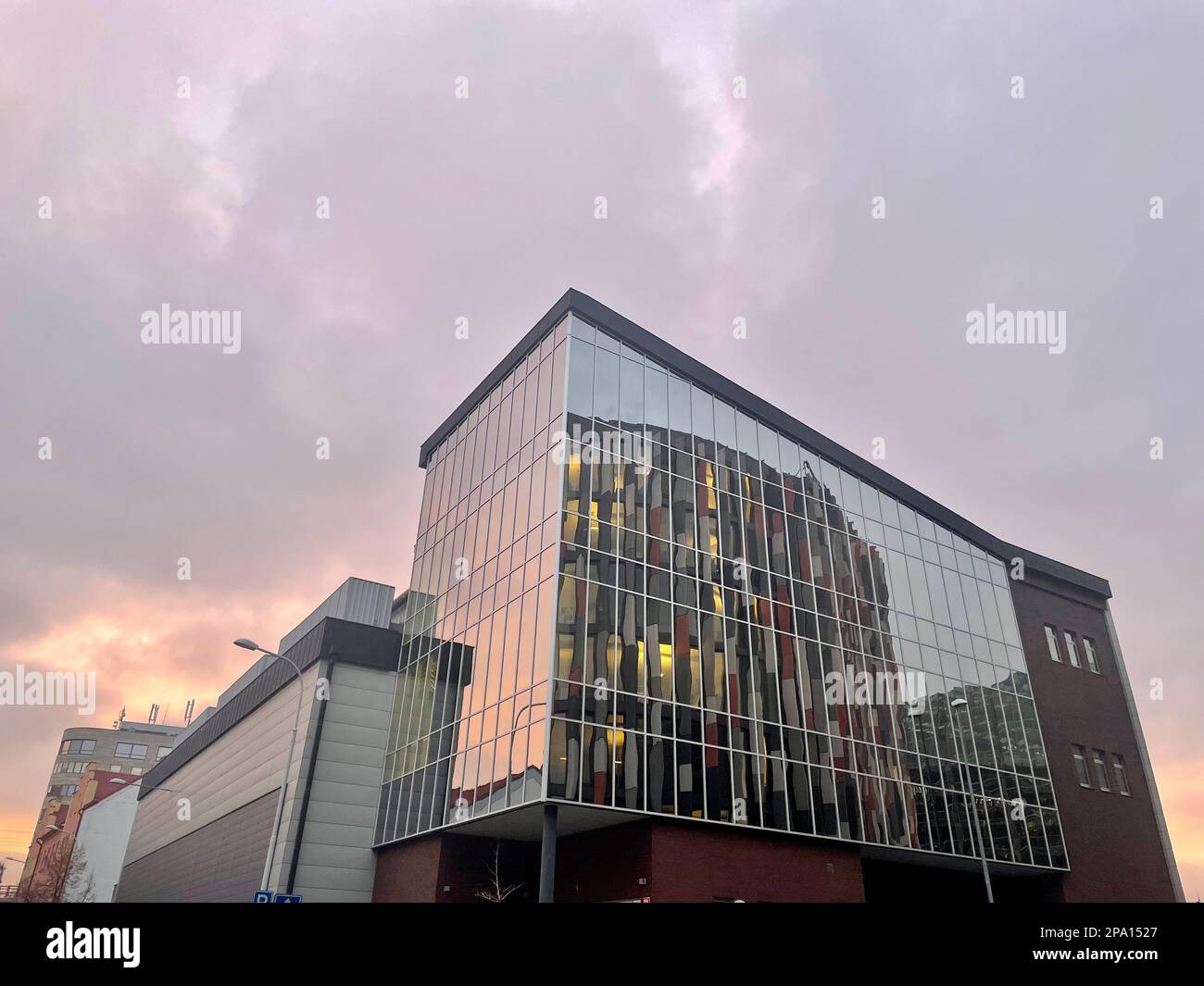 Reflection of the Main Point Karlin office building at dusk in the ...