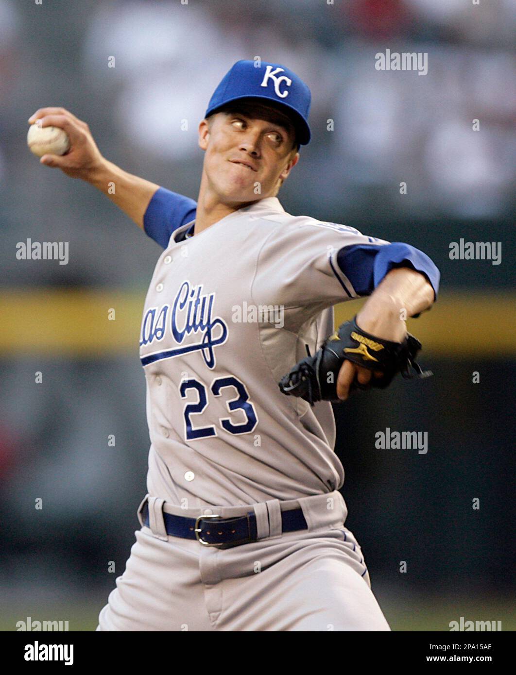 Kansas City Royals pitcher Zack Greinke winds up to deliver a pitch ...
