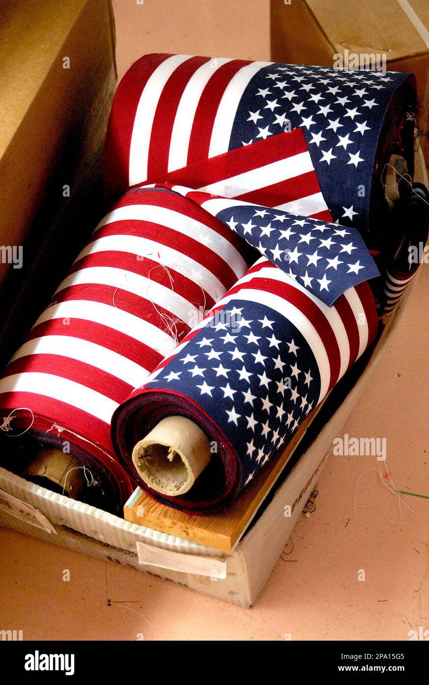 Rolls of flag material are photographed at Tennessee Flag Company's ...