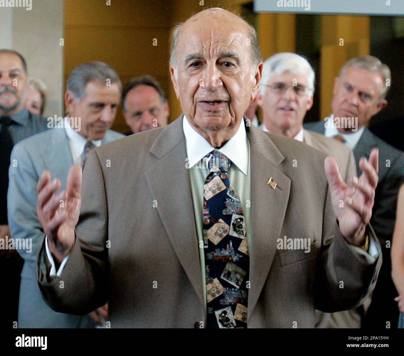 U.S. Magistrate Judge Peter Palermo gestures as he talks to guests at ...