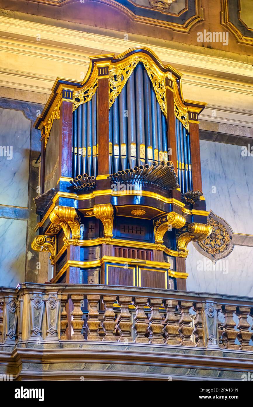 Antique pipe organ inside the landmark religious building.Church of ...