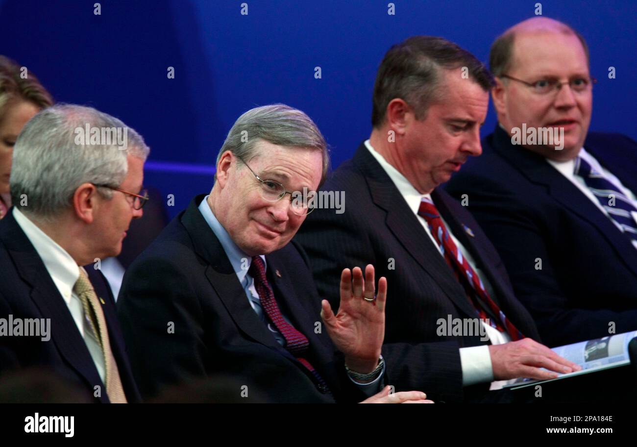 National Security Adviser Stephen Hadley, second from the left, waves ...
