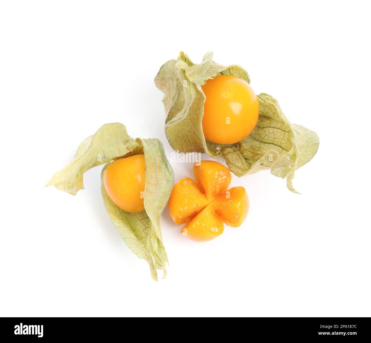 Cut and whole ripe physalis fruits with dry husk on white background ...